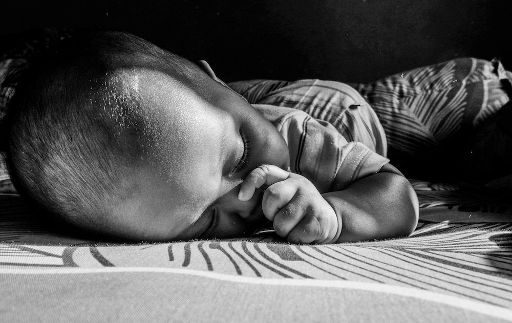 Top tips on encouraging your baby to roll over